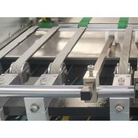 China LS-1200G Automatic Cutting and Grooving Machine for Cardboard - 4 Slots, Grooving + Corner Cutting, 20-80 pcs/min for sale