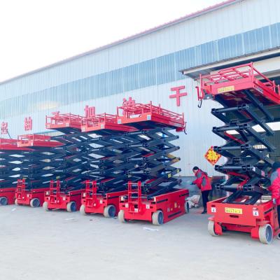 China 2300 kg Weight Outdoor Application Aerail Work Platform Electric Tracked Scissor Lift for sale