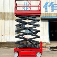 China CE ISO Certification 4-14m Electric Scissor Lift 200kg Capacity 500kg Hoisting Speed for sale