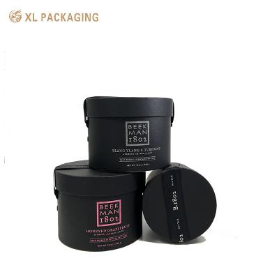 China Food-Grade Rigid Paperboard Cylindrical Paper Tube with Matte Lamination and Woven Ribbon Handle for Tea Packaging for sale