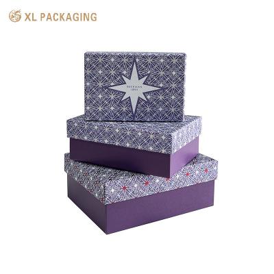 China Handmade Custom Star Pattern Rigid Gift Box with Matte Purple Base for Essential Oil and Skincare Packaging for sale