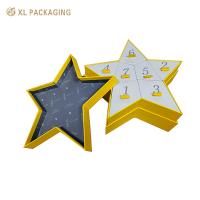 China XL Packaging Custom Packaging Box Factory Star Shape 7 Day Paper Advent Calendar Packaging Box For Cookie Candy Biscuits for sale