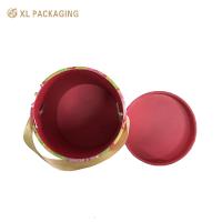 China XL Packaging Custom Packaging Box Factory Pink Cosmetic Paper Tube Face Cream Paper Cylinder Packaging With Ribbon Handle for sale