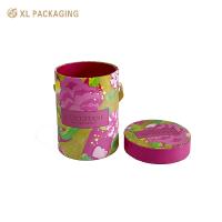 China XL Packaging Custom Packaging Box Factory Pink Cosmetic Paper Tube Face Cream Paper Cylinder Packaging With Ribbon Handle for sale