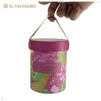 China XL Packaging Custom Packaging Box Factory Pink Cosmetic Paper Tube Face Cream Paper Cylinder Packaging With Ribbon Handle for sale