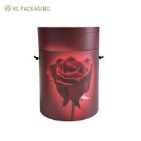 China Luxury Rose Flower Paper Tube Box with Custom Rose Artwork Black Rope Handle and Burgundy Red Matte Finish for sale