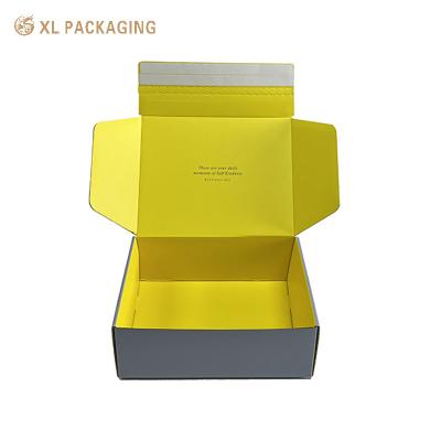 China Custom Printed Corrugated Mailer Boxes for Cosmetics | Luxury Grey & Yellow Shipping Boxes with Logo | Easy Tear Strip for Beauty Products for sale