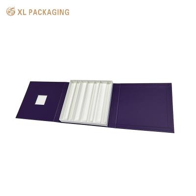 China Dual Open 7-Slot Purple Magnetic Chocolate Packaging Box with Full Embossed for sale