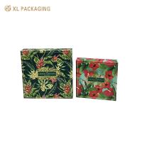 China Eco-Friendly 16 Cavity Chocolate Packaging Box with Gold Foil Logo and Floral Design for sale