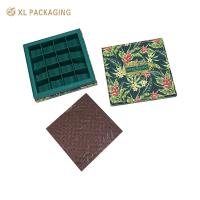 China Eco-Friendly 16 Cavity Chocolate Packaging Box with Gold Foil Logo and Floral Design for sale