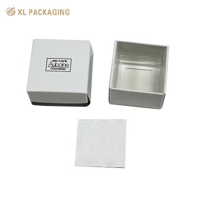 China Luxury White Embossed Chocolate Box with PET Tray - Flat Shippable Two-Piece Foldable Candy Gift Box with Black Foil Stamping for sale