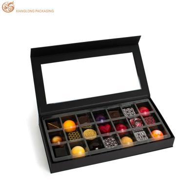 China Chocolate Packaging Box XL Book Shaped Magnetic Paperboard with PVC Window for sale