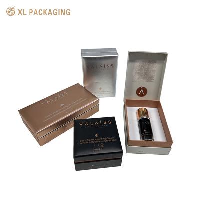 China ﻿XL Packaging Custom Printed Cosmetic Boxes Embossing Hinged Cosmetic Paper Box Rose Gold Foil LOGO For Skincare Bottle for sale