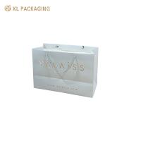 China XL Packaging Custom Logo Hard White Art Paper Bags  Luxury Shopping Packaging With Die-Cut Handles Scratch-Resistant Coating Easy Carry Design Durable For Heavy Gifts Stylish For Branded Experiences for sale