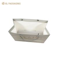 China XL Packaging Custom Logo Hard White Art Paper Bags  Luxury Shopping Packaging With Die-Cut Handles Scratch-Resistant Coating Easy Carry Design Durable For Heavy Gifts Stylish For Branded Experiences for sale