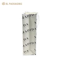 China XL Packaging Paper Bag Coated Paper White Color for Clothes Mall Shipping Bag Full Printing Shoes Packaging Hand Bag for sale