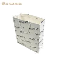 China XL Packaging Paper Bag Coated Paper White Color for Clothes Mall Shipping Bag Full Printing Shoes Packaging Hand Bag for sale