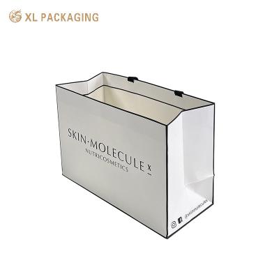 China XL Packaging Custom Packaging Factory Custom Printed Personalized Paper Bag For Shopping Handle Bag Shoes Clothing Packing Logo Printing Shopping Bag for sale