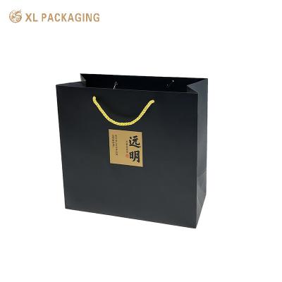 China XL Packaging Custom Packaging Factory Design Recycle Paper Bag Kraft Paper High Quality Cosmetic Clothing Paper Box With Logo for sale