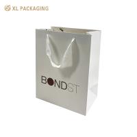China XL Packaging Custom Packaging Factory Professional Custom Paper Bag White Edge White One For Shopping Clothing Shoes Packing Shopping Bag With Logo for sale