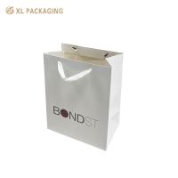 China XL Packaging Custom Packaging Factory Professional Custom Paper Bag White Edge White One For Shopping Clothing Shoes Packing Shopping Bag With Logo for sale