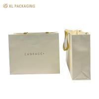 China XL Packaging Custom Packaging Factory Warm Color Paper Packaging Bags Eco friendly For Exhibition Promotion Events for sale