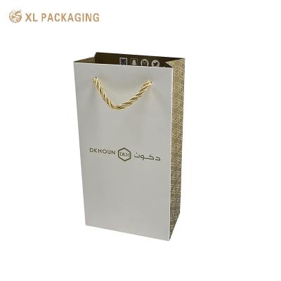 China XL PackagingEco-Friendly Packaging For Boutiques Gifts Retail High Quality Gold Color Recyclable Shopping Bags Fancy OPP String Handle Paper Bags With Gold Foil Stamping Matte Finish Reinforced Bottom for sale
