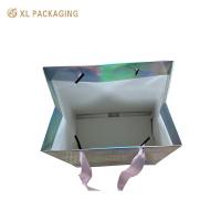 China XL Packaging Personalized Paper Gift Bags With Handles Custom Shiny Shopping Tote Bags Foil Stamping Custom Logo  Gloss Lamination Stylish Packaging For Retail Events Branded Gifting for sale