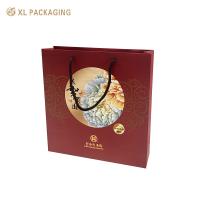 China Premium Custom Paper Bags with Black Handles – Eco-Friendly & Matte Lamination for Hotels and Retail for sale
