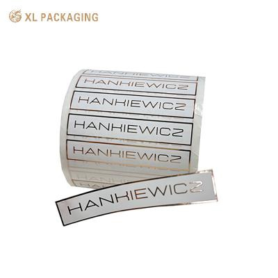 China Embossed textured paper stickers rectangular custom labels for business packaging for sale