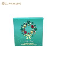 China Custom Green Luxury Packaging Christmas Wrapping Decoration Bows Gold Hot Stamping Lid And Base Boxes For Cosmetic for sale