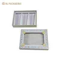China Custom Printed Gift Box with Clear PET Window Rigid Cardboard Material and Silver Foil Stamping for Cosmetics for sale