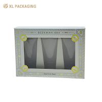 China Custom Printed Gift Box with Clear PET Window Rigid Cardboard Material and Silver Foil Stamping for Cosmetics for sale
