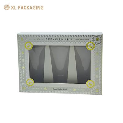 China Custom Printed Gift Box with Clear PET Window Rigid Cardboard Material and Silver Foil Stamping for Cosmetics for sale