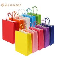 China XL Packaging Custom Logo Printed Paper Bags for Luxury Shoes Clothes and Jewelry Packaging for sale