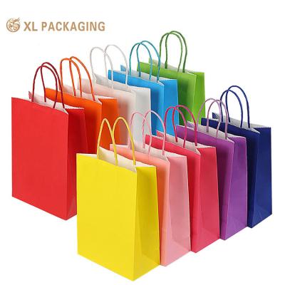 China XL Packaging Custom Logo Printed Paper Bags for Luxury Shoes Clothes and Jewelry Packaging for sale
