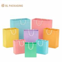 China XL Packaging Custom Packaging Bag Luxury Matte Gift Shopping Paper Bag With Logo For Clothing Jewelry Wine for sale
