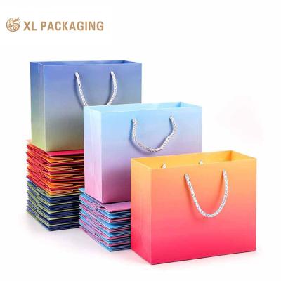 China XL Packaging Custom Packaging Bag Luxury Matte Gift Shopping Paper Bag With Logo For Clothing Jewelry Wine for sale