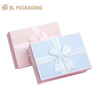 China Custom Logo Printing Luxury Design Cardboard Paper Box , Clothes Skincare Festival Gift Packaging Box With Ribbon Bow for sale