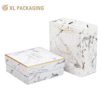 China Custom Logo Printing Luxury Design Cardboard Paper Box , Clothes Skincare Festival Gift Packaging Box With Ribbon Bow for sale