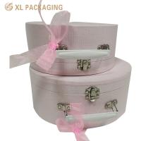 China XL Packaging Custom Packaging Box Factory Customized Recyclable Paper Perfume Biscuit Packaging Round Paper Suitcase Box Case With Metal Handle for sale