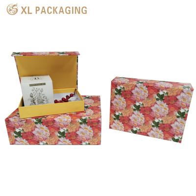 China Eco-Friendly Paperboard Magnetic Closure Gift Box with Vibrant Floral Printing and Soft Fabric-Lined Interior for sale
