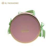 China XL Packaging Custom Printed Cosmetic Boxes Custom Luxury Boxes WholesalRound Cosmetic Paper Box With Unique Design Mini Drawer Box Green Ribbon Handle And Gold Tray For Beauty Essentials for sale