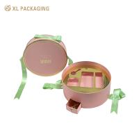 China XL Packaging Custom Printed Cosmetic Boxes Custom Luxury Boxes WholesalRound Cosmetic Paper Box With Unique Design Mini Drawer Box Green Ribbon Handle And Gold Tray For Beauty Essentials for sale