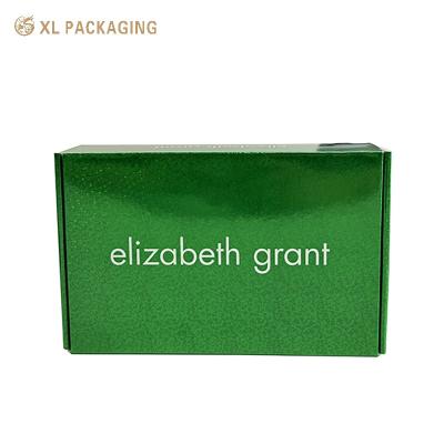 China Shiny Holographic Green Mailer Box with Colorful Sparkle | Flat Pack Cosmetic Packaging with 2-Cavity EPE Foam Insert for sale