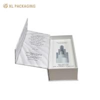 China ﻿XL Packaging Custom Printed Cosmetic Boxes Embossed Black Foil Logo Kraft Paper Packaging Box for Eco Friendly Skincare Products for sale