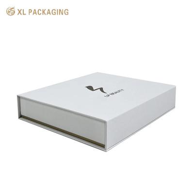 China Luxury White Magnetic Flip Rigid Box for Beauty Device | Velvet Lined EVA Tray | Matte Gold Foil Stamped Logo for sale