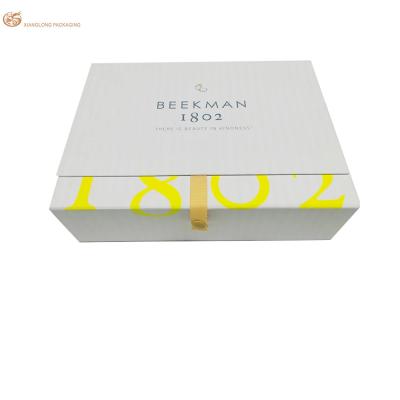 China Custom Logo Metallic Button Closure Gift Paper Box Double Door Skin Care Paper Box With Embossed Logo for sale