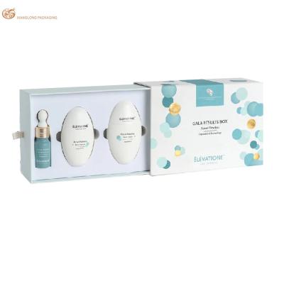 China ﻿XL Packaging Custom Printed Cosmetic Boxes Custom Logo Sliding Drawer Box Rigid Cardboard Skin Care Paper Box Soap Packaging Box With Ribbon for sale