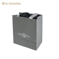 China XL Packaging Custom Packaging Box Factory Wholesale Custom Pantone Color Disposable Hotel Using Paper Bag With Golden Strings Handle for sale
